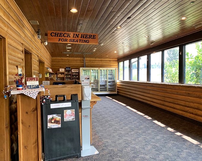 The check-in area welcomes you with warm wood tones and the promise of a meal worth any wait you might encounter.