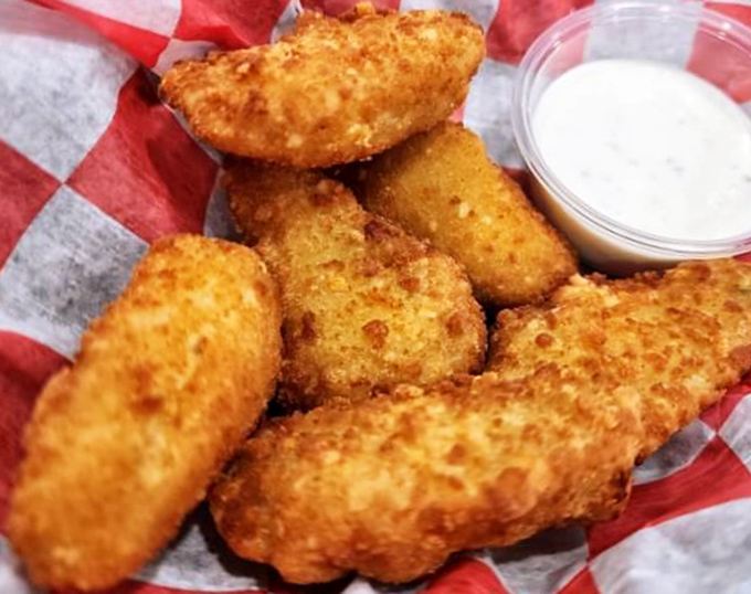 Golden-fried jalape&ntilde;o poppers that crunch like autumn leaves, offering that perfect balance of creamy, spicy comfort that makes Monday feel like Friday.