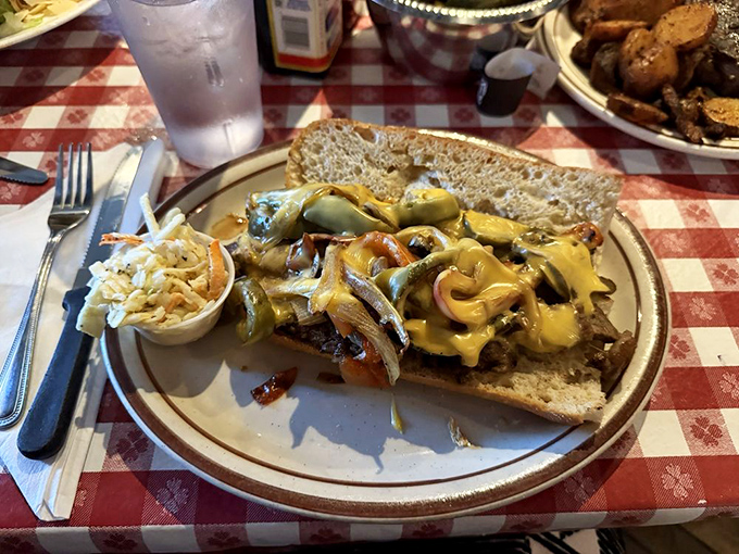When a sandwich requires this much napkin commitment, you know you're in for something special. Those melted cheese rivers demand respect.