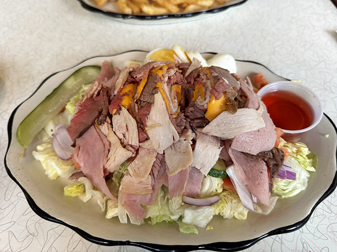 The chef salad that answers the eternal question: "How much meat can you reasonably pile onto lettuce?" The answer: gloriously more than you'd expect.