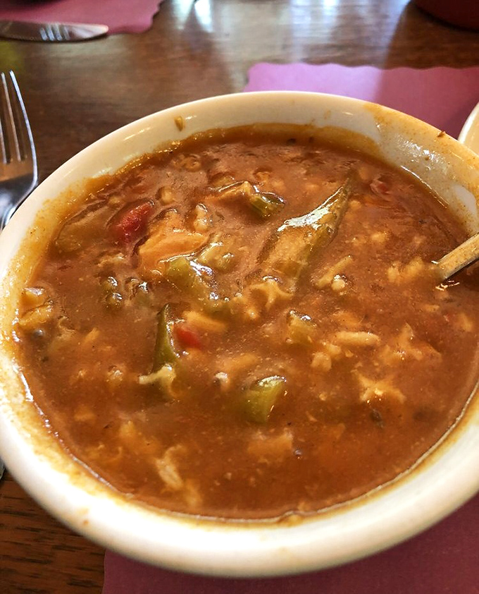 A bowl of gumbo that tells stories with each spoonful. The kind of soup that makes you want to cancel your afternoon plans and order another round.