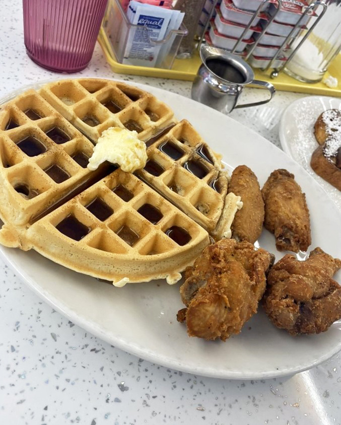 Chicken and waffles: the breakfast-lunch alliance that proves some of history's greatest partnerships involve maple syrup and crispy coating.