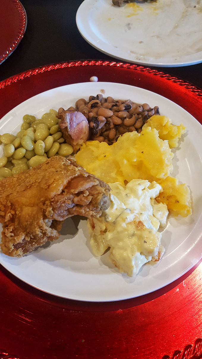 The kind of plate that makes you want to invent new words for delicious&mdash;fried chicken, field peas, and mac and cheese in perfect harmony.