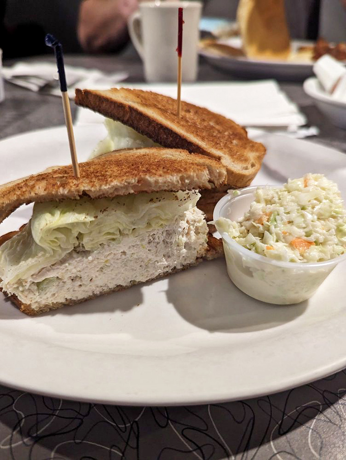 This chicken salad sandwich isn't playing around &ndash; it's the heavyweight champion of lunch, with coleslaw as its trusty cornerman.