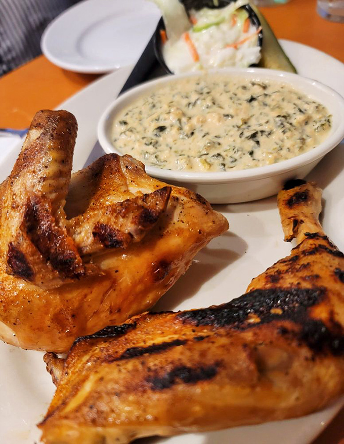 Chicken that's clearly living its best afterlife, accompanied by creamed spinach so good it could make Popeye weep with joy.