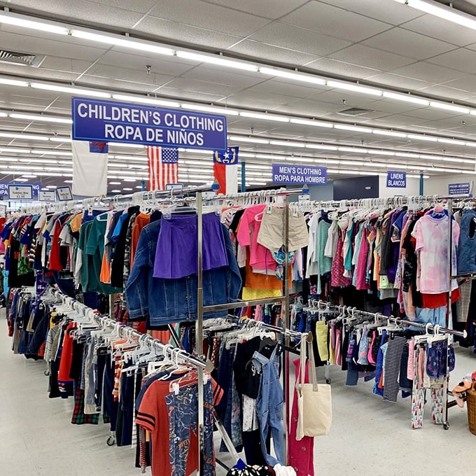 Children's clothing organized with military precision. Those tiny jeans could outfit an entire preschool for less than the cost of one mall outfit.
