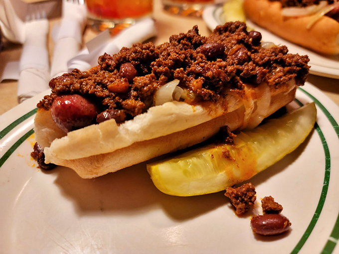 The chili dog that understands its mission: deliver maximum flavor with zero apologies for the mess ahead.