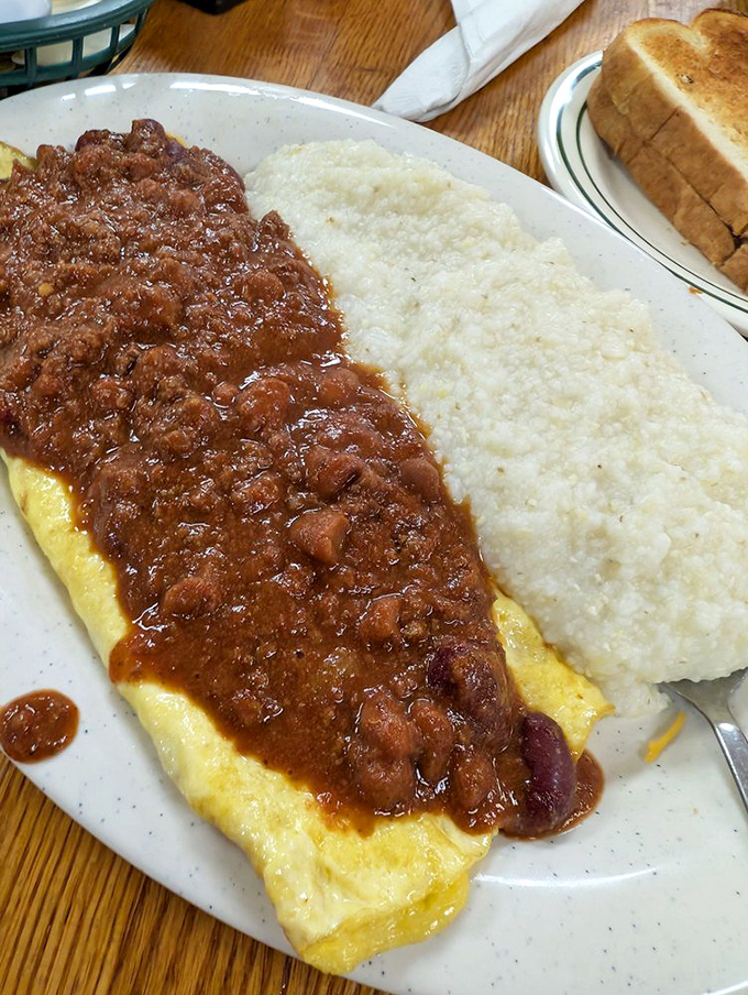 When an omelet meets chili and grits join the party, you've got a plate that says "Good morning" with Southern enthusiasm.