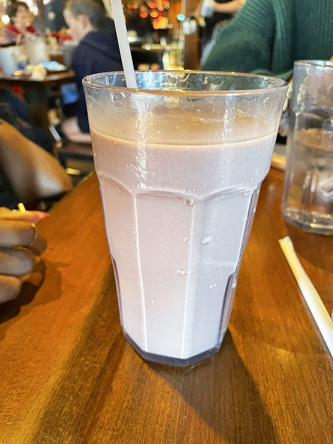 Cold chocolate milk in a proper glass, because some childhood classics never need improving, just celebrating with every sip.