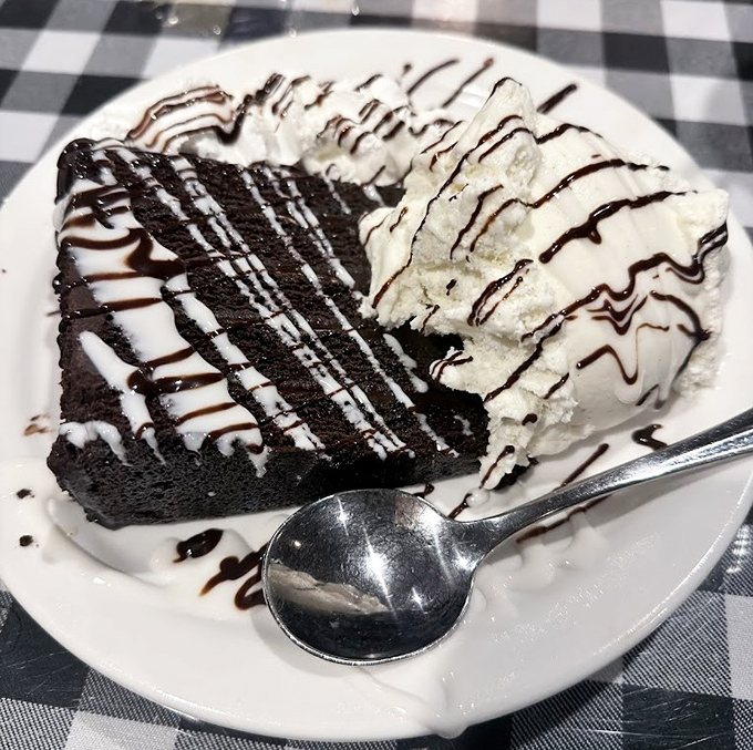 This chocolate cake with vanilla ice cream isn't just dessert &ndash; it's the grand finale that makes you forget you just consumed your weight in steak.