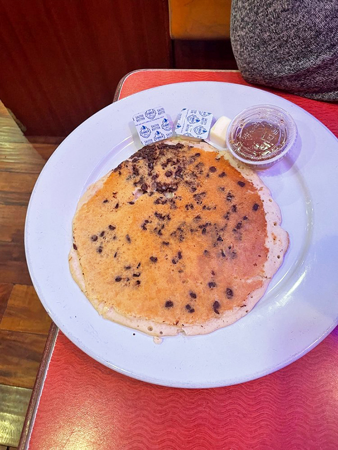 A chocolate chip pancake the size of a frisbee. The maple syrup on the side isn't a condiment&mdash;it's a commitment.