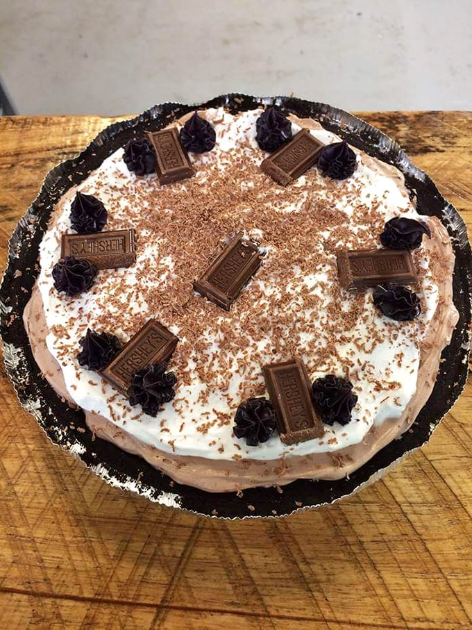 This chocolate cream pie with its Hershey's bar garnish isn't trying to impress food critics &ndash; it's busy making memories for everyone lucky enough to grab a slice.