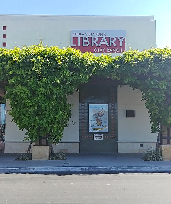 The Otay Ranch Library branch wraps knowledge in vine-covered charm – proving intellectual wealth requires no premium zip code.
