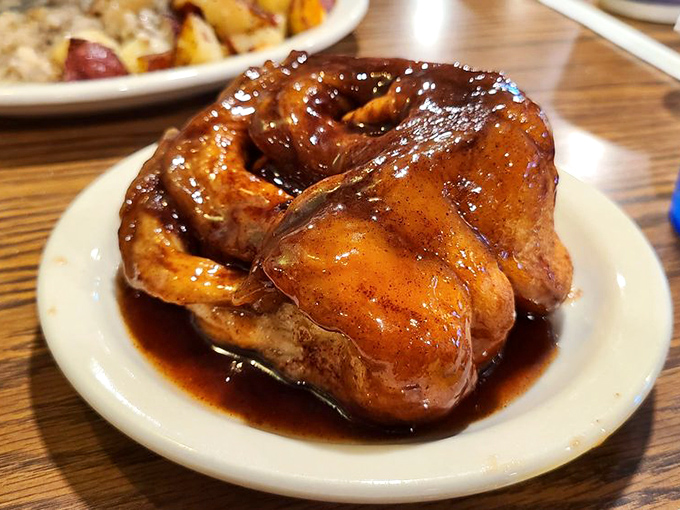 Bubba's Cinnamon Roll doesn't just arrive at your table&mdash;it makes an entrance. Glistening with sweet glaze and swimming in cinnamon-scented syrup that demands to be sopped up.