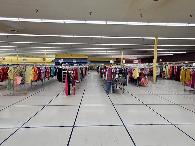 The perspective down this clothing canyon reveals the true scale of Mega Thrift&mdash;less store, more indoor city of secondhand splendor.