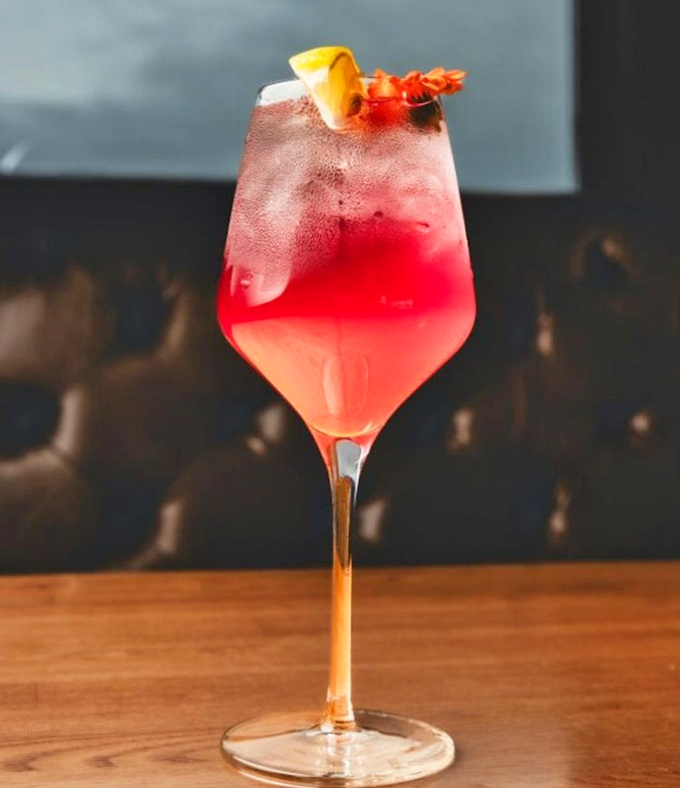 This rosy cocktail looks like sunset in a glass and probably tastes twice as romantic.