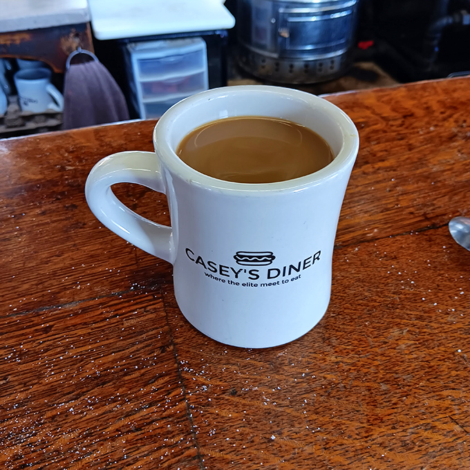 The mug that launched a thousand mornings. Casey's coffee comes with a side of nostalgia in this classic diner vessel.