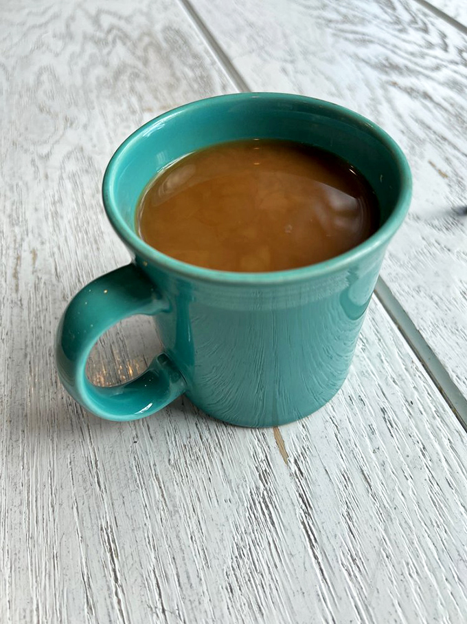 Simple turquoise mug filled with proper coffee&mdash;sometimes the best moments arrive in the most unassuming packages.