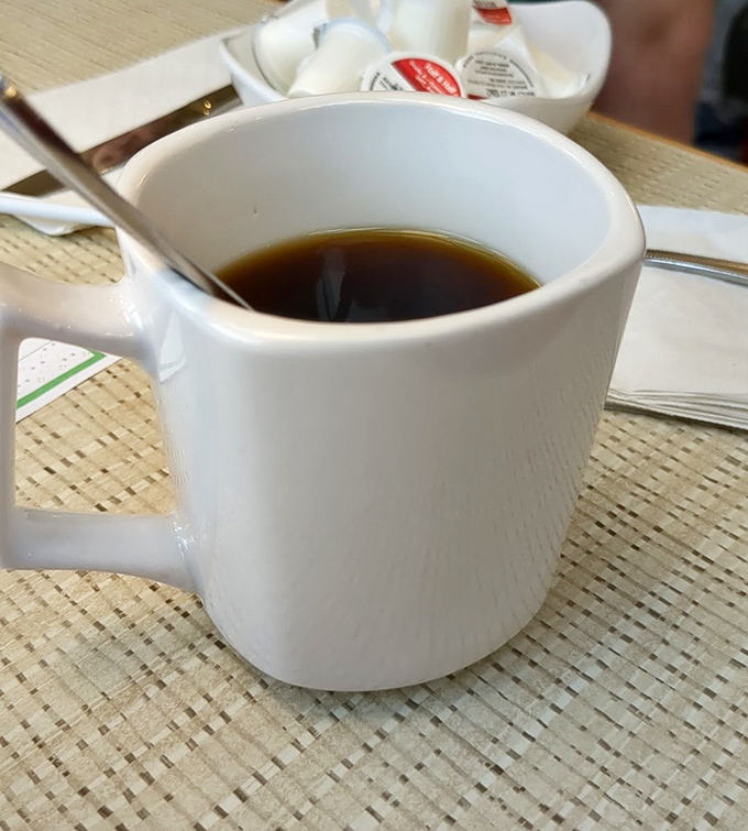 The unsung hero of breakfast&mdash;a humble mug of coffee that's seen more morning revelations and weekend plans than a therapist's notebook.