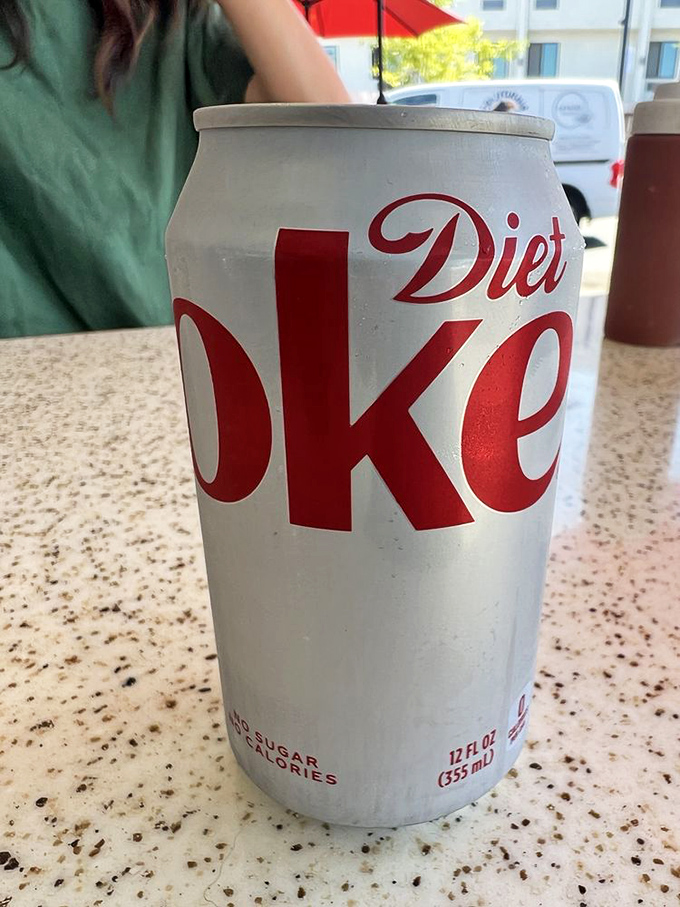 The obligatory Diet Coke&mdash;because balance is important when you're about to consume a burrito the size of your forearm.