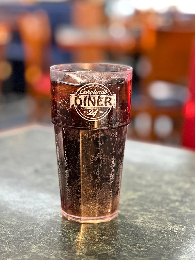 The iconic Carolina's Diner cup holds the elixir of diner life &ndash; cola that somehow tastes better here than anywhere else on earth.