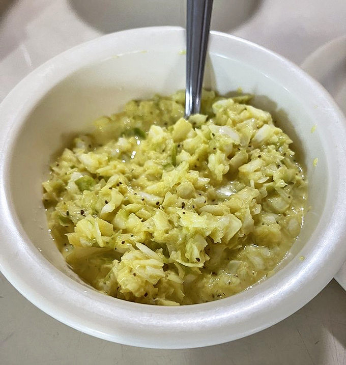 Cole slaw that knows its purpose&mdash;to cut through rich barbecue with cool, tangy crunch. This isn't some afterthought side; it's an essential supporting character.