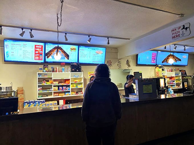 The concession counter&mdash;where movie night essentials transform ordinary evenings into core memories, one buttery handful at a time.