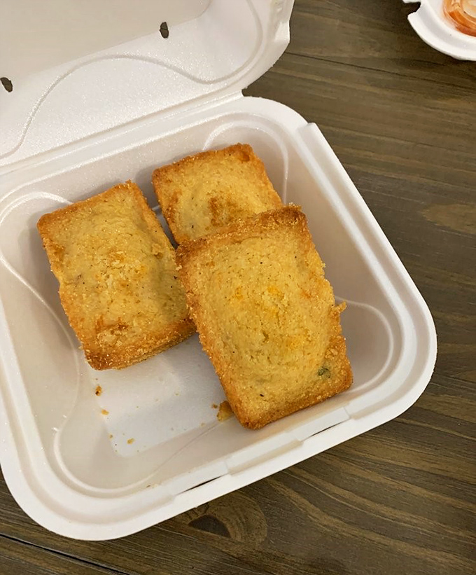 Cornbread squares golden enough to make Fort Knox jealous. The perfect sponge for soaking up every last drop of sauce.
