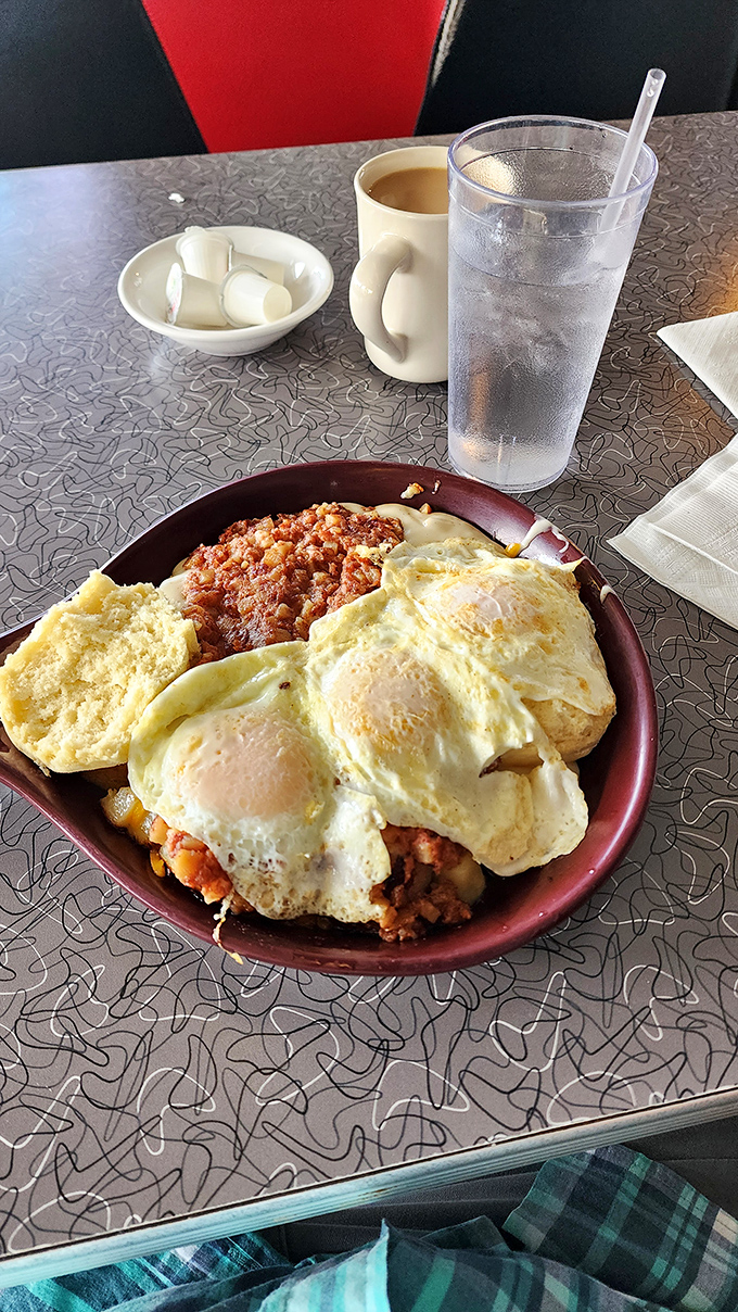 Eggs perched atop a mountain of corned beef hash like climbers who've reached the summit of Breakfast Everest.