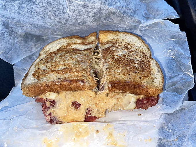 The Reuben sandwich&mdash;where corned beef, sauerkraut, and melted cheese perform a harmony so perfect it deserves its own Broadway show.