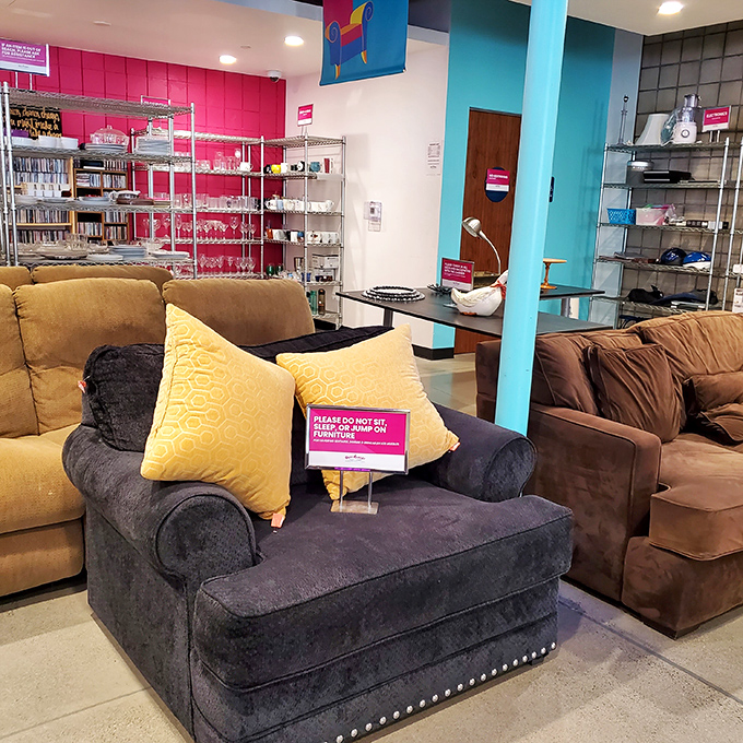 Comfy couches await new homes, with cheerful signs politely requesting you don't rehearse your potato impression on the merchandise.