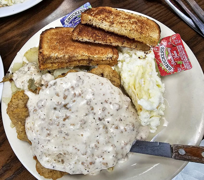 Country fried steak with gravy so good you'll contemplate drinking it &ndash; comfort food that hugs you from the inside out.