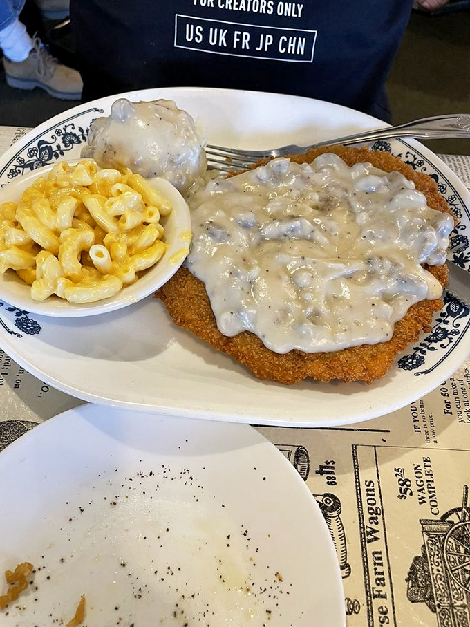 Country fried steak smothered in gravy with mac and cheese that would make your grandmother simultaneously proud and jealous of the competition.