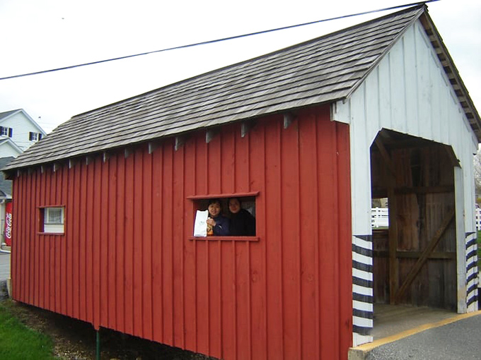 The bright red covered bridge offers a splash of color against the landscape&mdash;functional architecture that's become an enduring symbol of rural Pennsylvania.