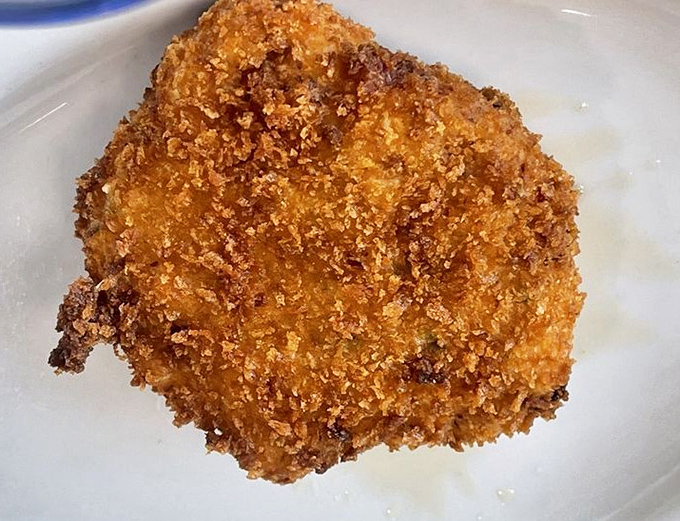 This golden-brown crab cake isn't just fried&mdash;it's been elevated to crispy seafood royalty that would make Maryland proud.