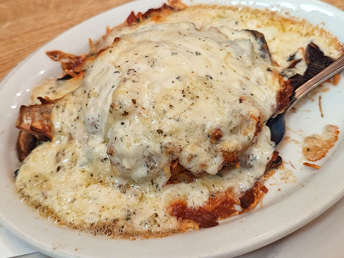 This isn't just cheese &ndash; it's a molten masterpiece that transforms whatever lies beneath into something transcendently delicious.