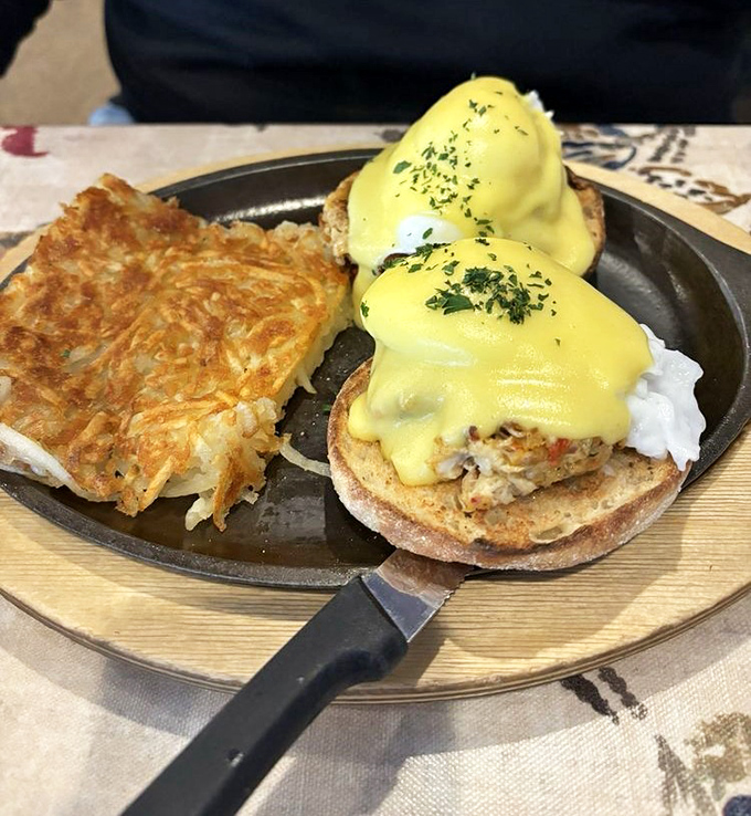 Eggs Benedict gets the coastal treatment with crab cakes standing in for English muffins. That hollandaise river should have its own zip code.