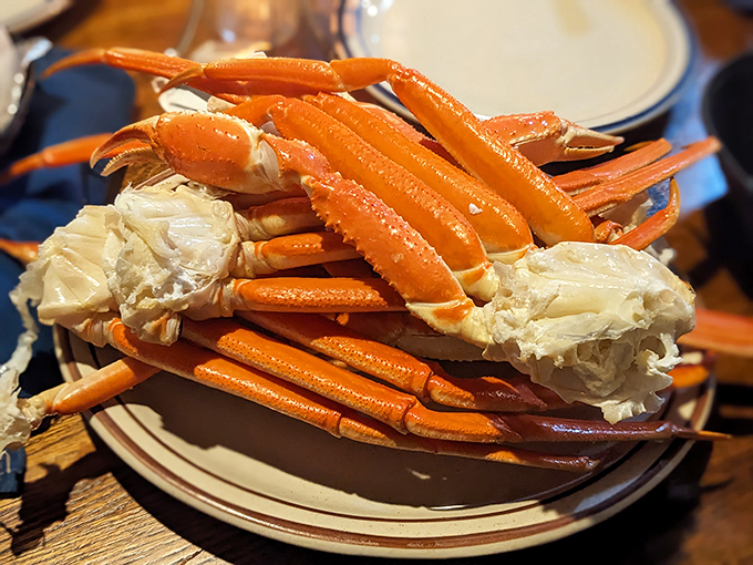 Snow crab legs: nature's way of making you work for your dinner. The bright orange shells hide treasure worth every bit of the effort.