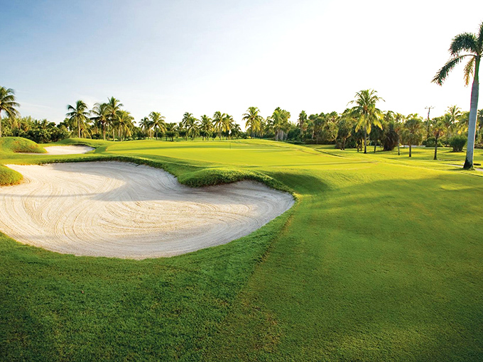 Crandon Golf's emerald fairways and brilliant white sand traps create a golfer's dream where even a bogey comes with an ocean view.