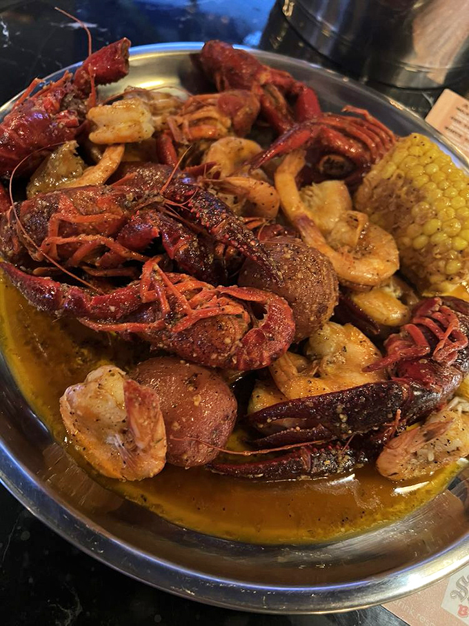 Crawfish, potatoes, and corn swimming in liquid gold&mdash;like a Cajun treasure chest that requires no map, just a healthy appetite.