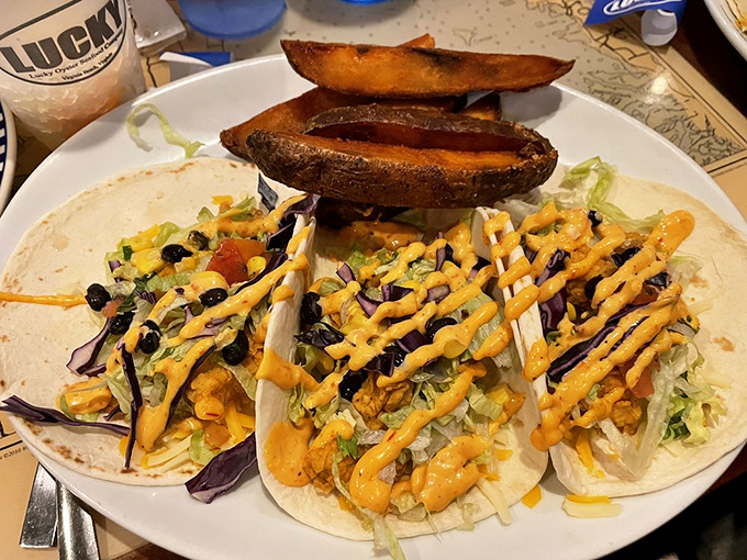 Fish tacos that bring the beach party to your taste buds. That drizzle of sauce is like the perfect sunset over an ocean of flavor. 