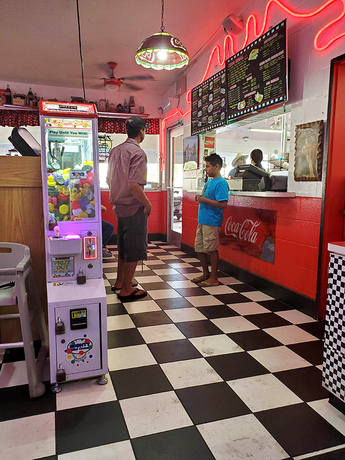 The timeless ritual of ordering at the counter &ndash; where anticipation builds with each step closer to burger bliss.