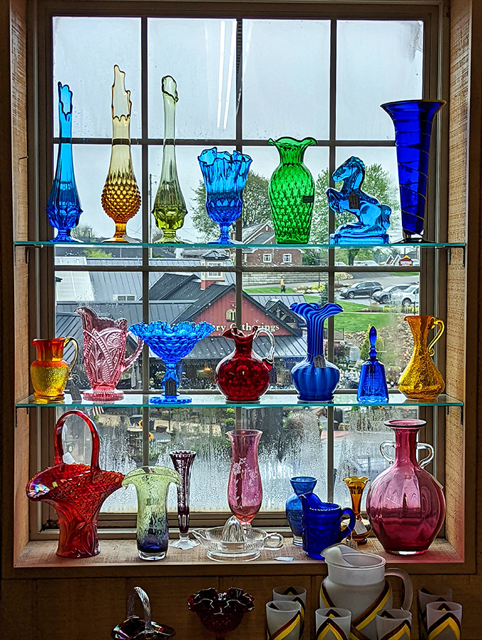 Sunlight transforms colored glass into a stained-glass cathedral of collectibles &ndash; each piece catching the light like jewels in a treasure chest.