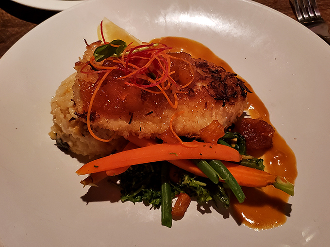 A golden-fried seafood platter that makes you wonder why anyone would eat anything else &ndash; the calamari practically dares you not to smile.