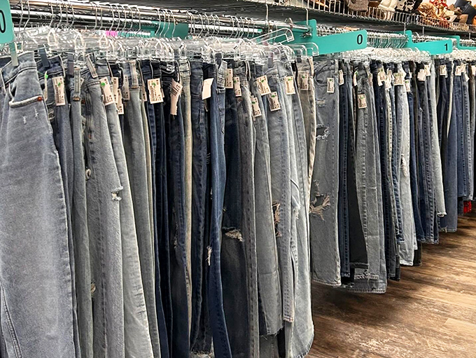 The wall of denim possibilities. Each pair tells a different story, from "barely worn" to "perfectly broken in" &ndash; all at prices that won't break you.
