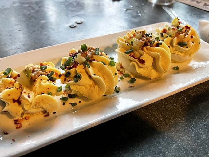 Deviled eggs elevated to art form. These little yellow boats of deliciousness are what appetizer dreams are made of.