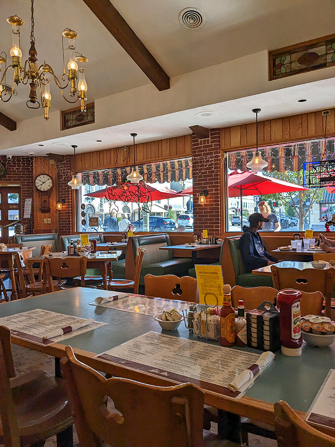 Morning light streams through windows, illuminating tables where countless coffee cups have been refilled and breakfast dreams fulfilled.