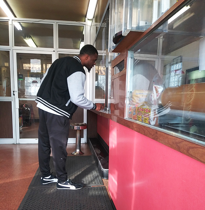 The time-honored tradition of the barbecue wait. Like they say, good things come to those who stand patiently at the counter.