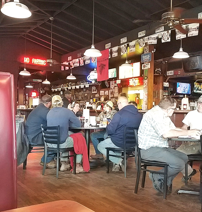 The universal language of barbecue brings folks together at the counter &ndash; notice nobody's looking at their phones, just the food.