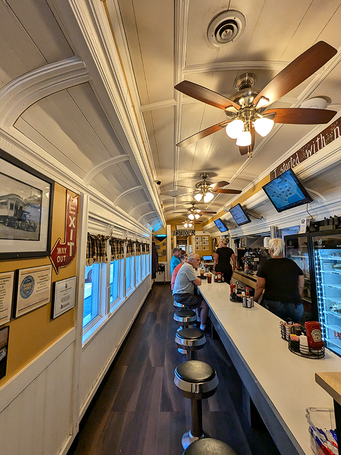 Classic diner counter seating&mdash;where solo diners become regulars and regulars become family, one cup of coffee at a time.